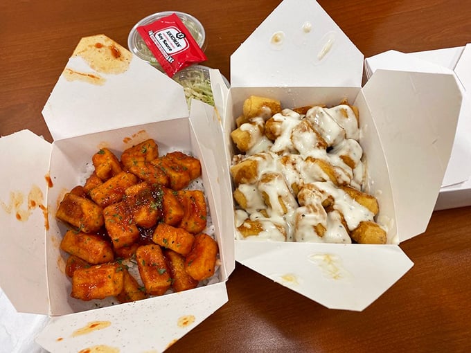 Take-out boxes filled with culinary treasure&mdash;one spicy, one creamy&mdash;proof that the best things come in unassuming packages.