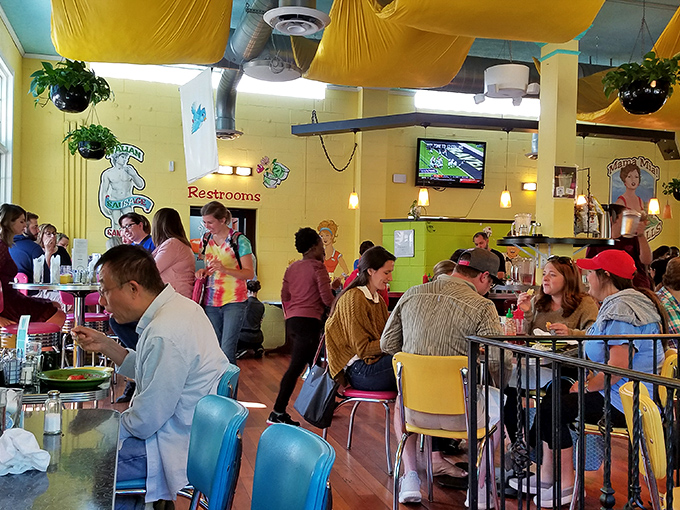 Where breakfast dreams come true&mdash;a full house of happy diners proving that morning people and "need coffee first" people can coexist under one sunny yellow roof.