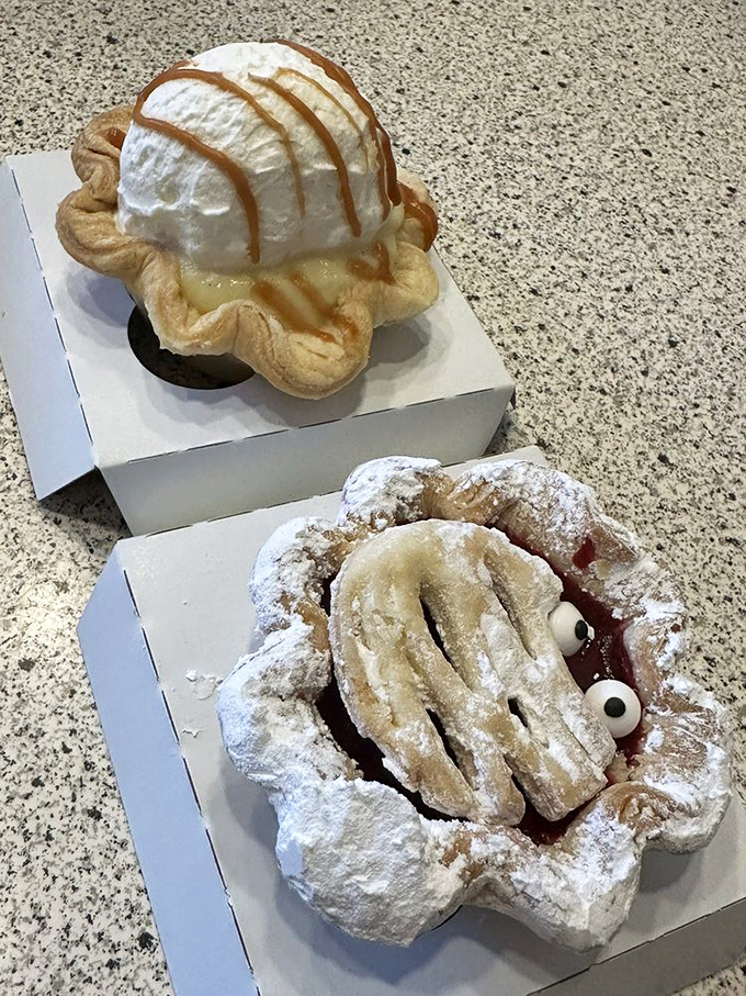 A cream pie with caramel drizzle sitting atop what appears to be a red velvet base&mdash;proof that sometimes the best relationships are unexpected combinations.