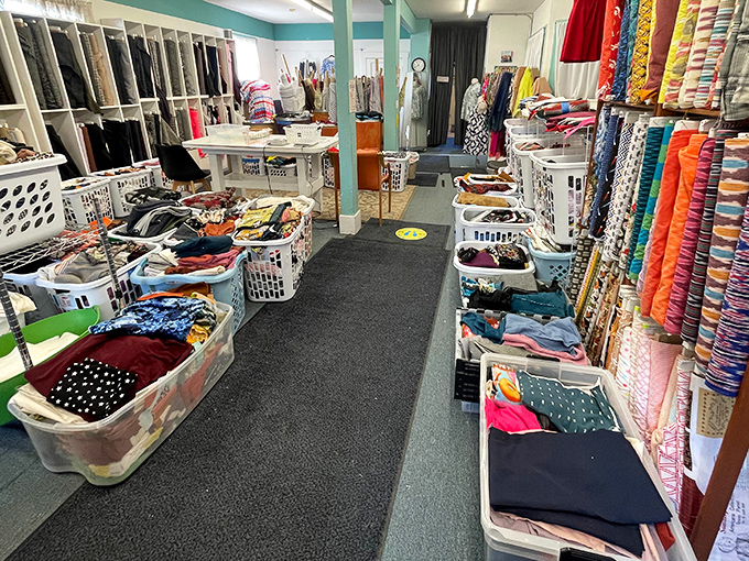 Fabric shopping becomes a tactile adventure when bins overflow with possibilities and each aisle promises new textile discoveries.