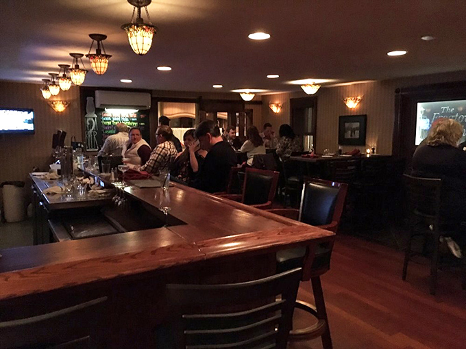 The bar area hums with possibility and conversation. Those empty glasses are just waiting to become part of someone's "remember that amazing night" story.