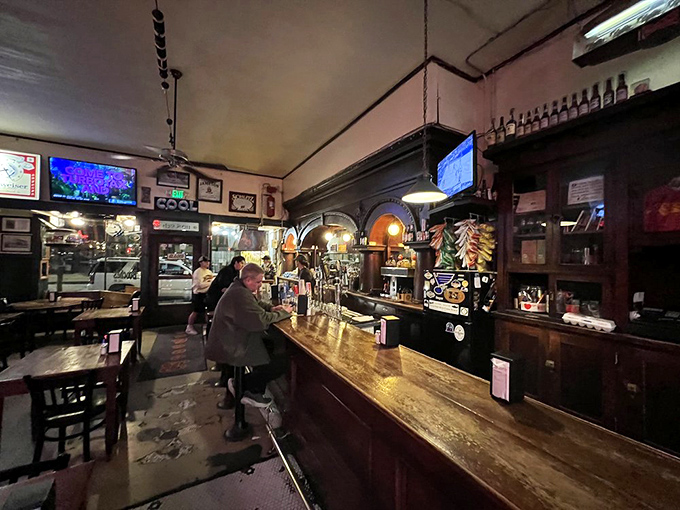 At this bar, strangers become friends over burgers and beers, continuing conversations that have been flowing since Chester Arthur was president.