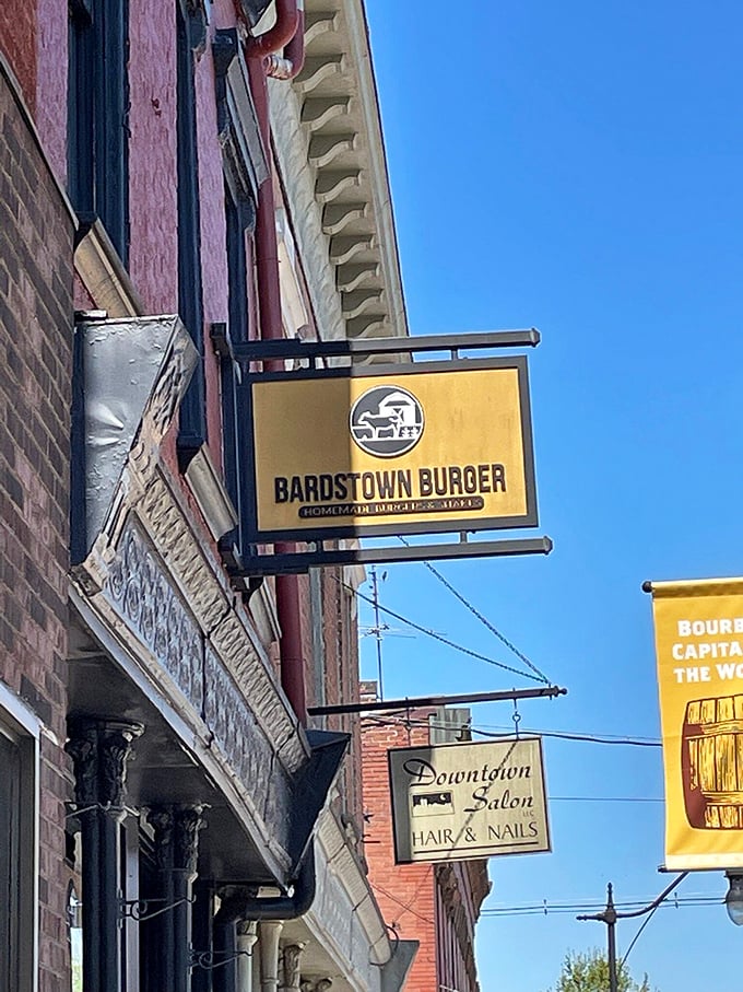 Hanging proudly above Bardstown's historic streets, these signs tell a delicious story&mdash;one where burgers and bourbon are the heroes we deserve.