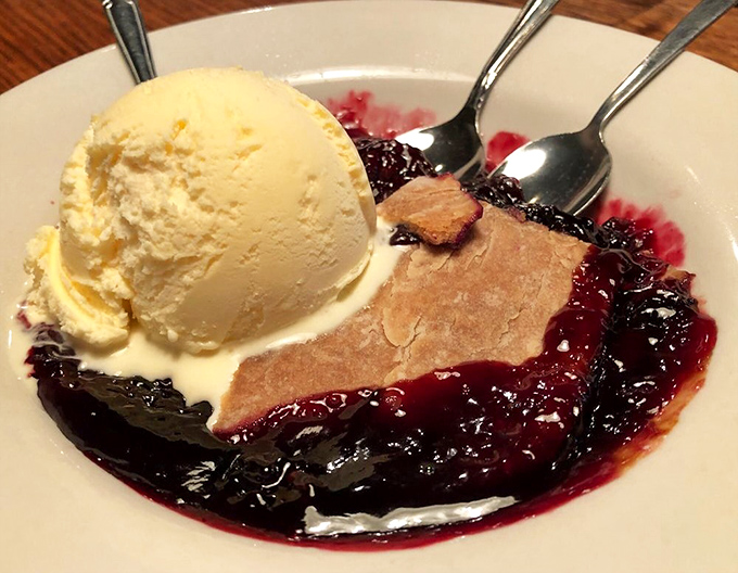 Blueberry cobbler that strikes the perfect balance between warm, fruity filling and flaky crust&mdash;the melting ice cream is just showing off.