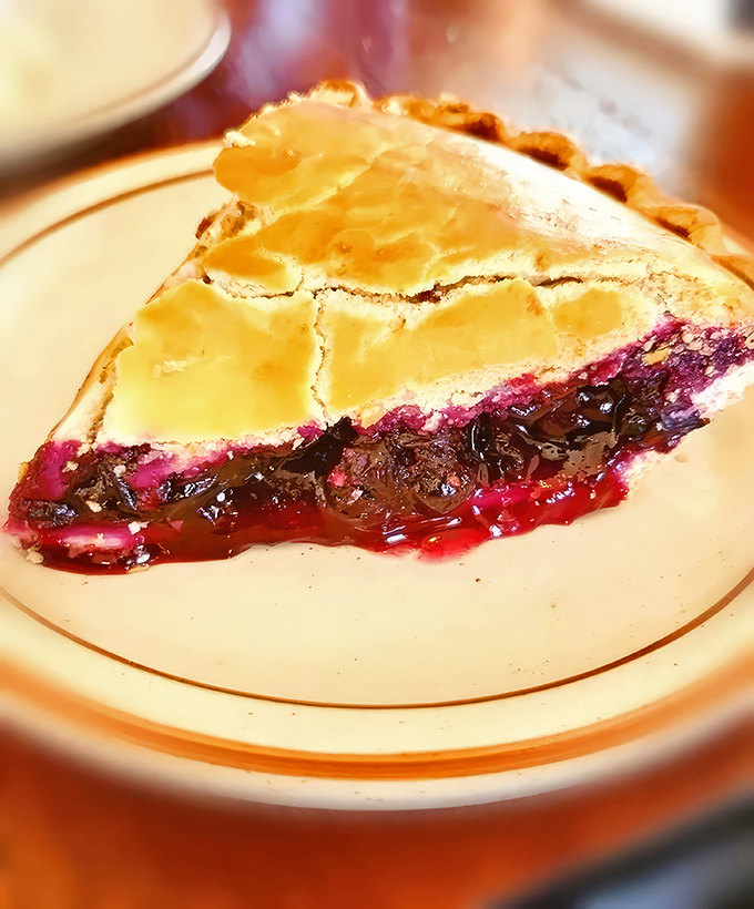 A slice of blueberry pie that doesn't need Instagram filters&mdash;that perfect balance of sweet-tart filling and golden crust speaks for itself.