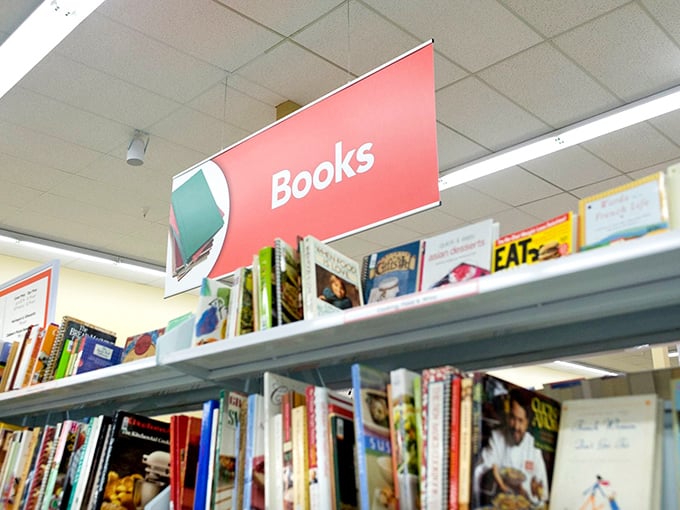 The book section: where literary treasures and abandoned beach reads coexist peacefully, waiting for their next chapter in someone else's home.