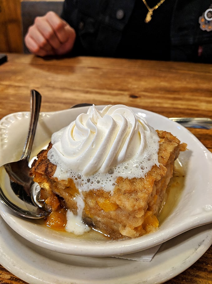 Bread pudding that would make your grandmother both jealous and proud. That whipped cream crown is well-deserved royalty.