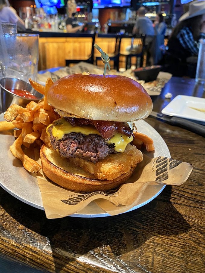 The breakfast burger laughs at conventional meal times, saying "Why choose between bacon, egg, and beef when you can have the holy trinity?"