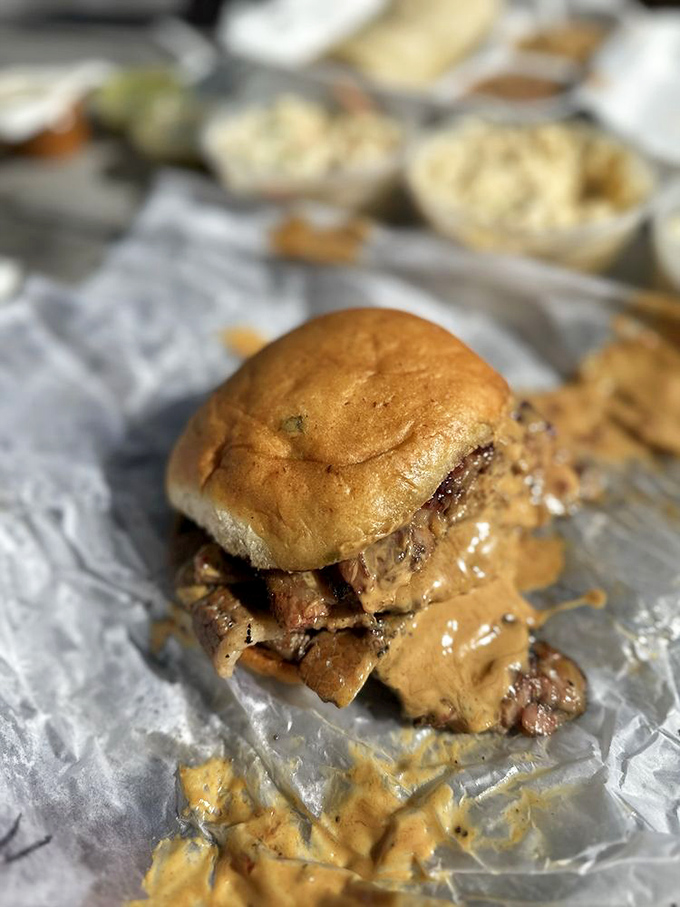 When a sandwich requires engineering skills to eat, you know you're in for something special—this brisket doesn't just satisfy, it conquers.