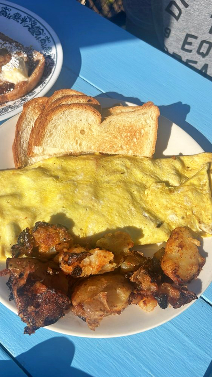 This omelet didn't just incorporate vegetables&mdash;it embraced them wholeheartedly. A colorful rebellion against bland breakfasts everywhere, topped with fresh scallions for good measure.