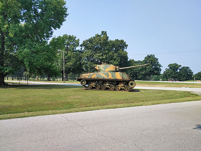 A vintage tank stands guard at Carthage Municipal Park, a reminder of the town's military history. History lesson meets playground equipment.
