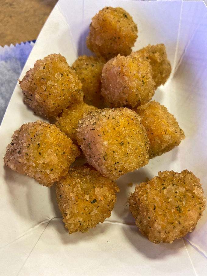 Hush puppies that actually make you want to listen. These golden orbs of cornmeal goodness are the perfect sidekick to any dog.