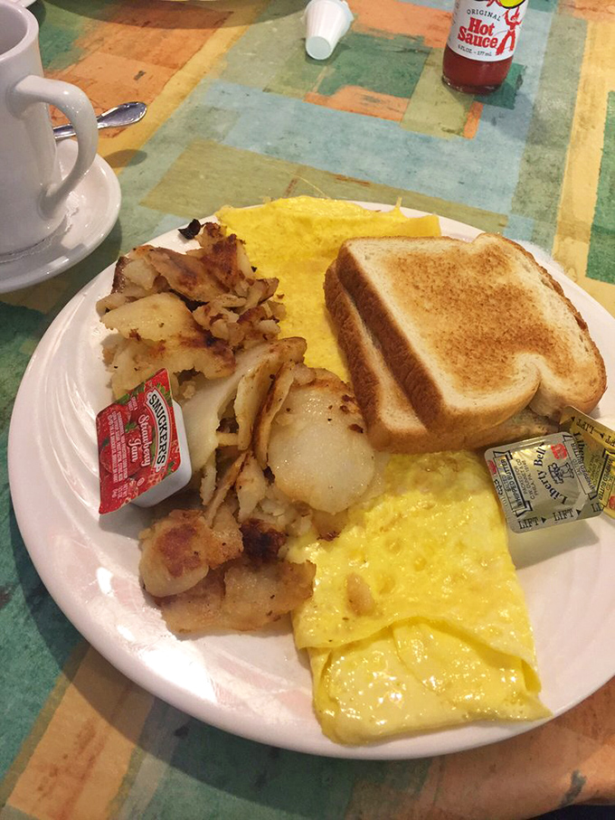 Golden cheese omelet meets crispy home fries in a breakfast production that deserves its own Tony Award for "Best Morning Performance."