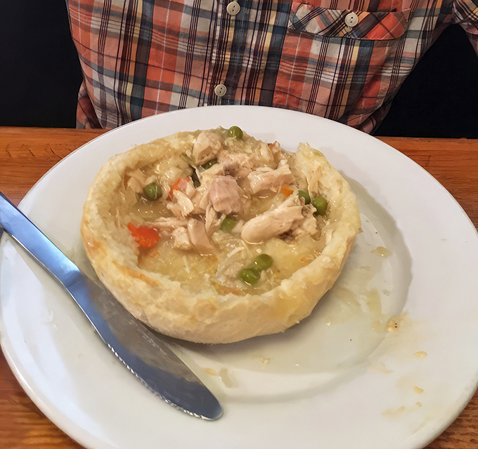 This chicken pot pie isn't just comfort food&mdash;it's a warm hug in a flaky crust. The steam rising carries memories of Sunday dinners past.