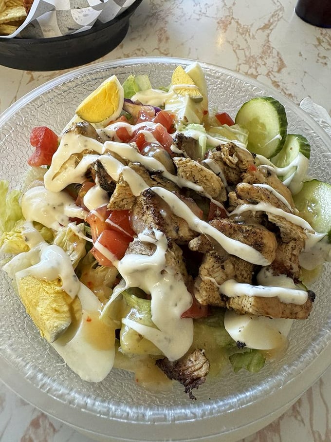 A chicken salad that doesn't hide behind mayo &ndash; it celebrates with fresh vegetables in a bowl that's seen more winners than Churchill Downs.