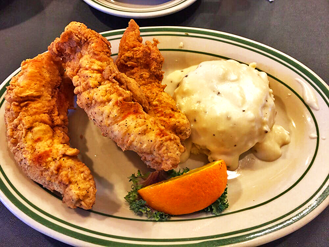 Chicken strips that actually deserve the name "tender." That mound of mashed potatoes is practically begging for a gravy swimming pool.