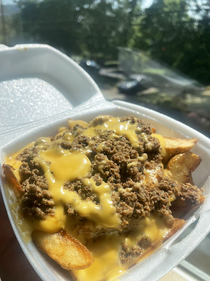 Chili cheese fries that laugh in the face of utensils&mdash;a glorious mess that makes you glad you wore your stretchy pants.