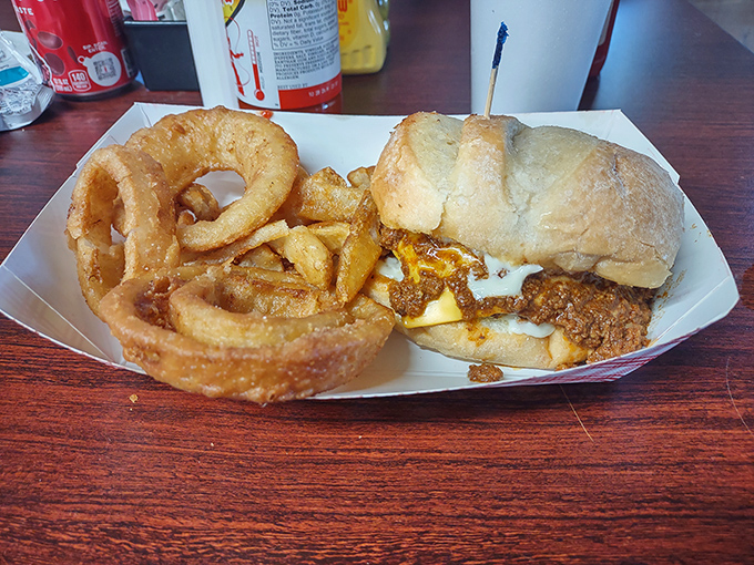 A cheeseburger with attitude, accompanied by onion rings the size of bracelets. Simple food done right is never simple.