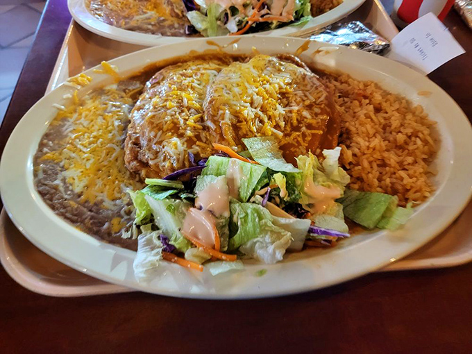 The chile relleno platter showcases the kitchen's expertise with this classic. A cheese-stuffed poblano pepper that's been battered, fried, and bathed in savory sauce.