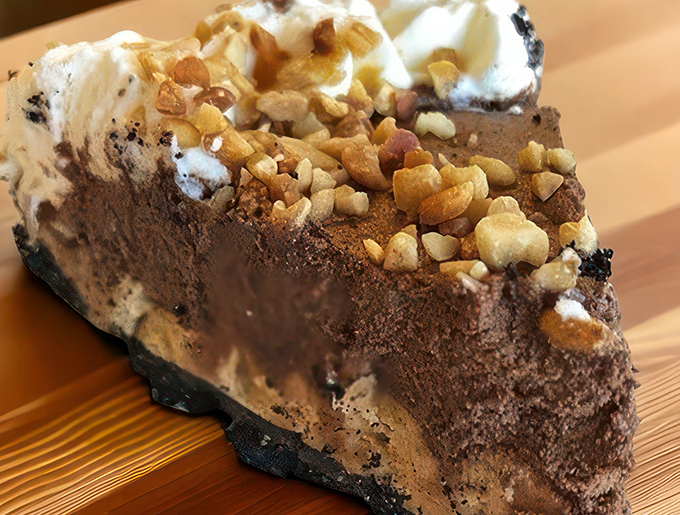 A slice of chocolate peanut butter silk pie that makes you wonder if you've been wasting your life eating lesser desserts.