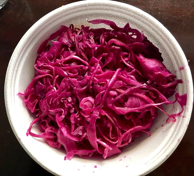 The vibrant magenta slaw isn't just a side&mdash;it's the supporting actor that deserves its own Oscar. Tangy, crisp, and the perfect foil to Pretty Bird's fiery main event.