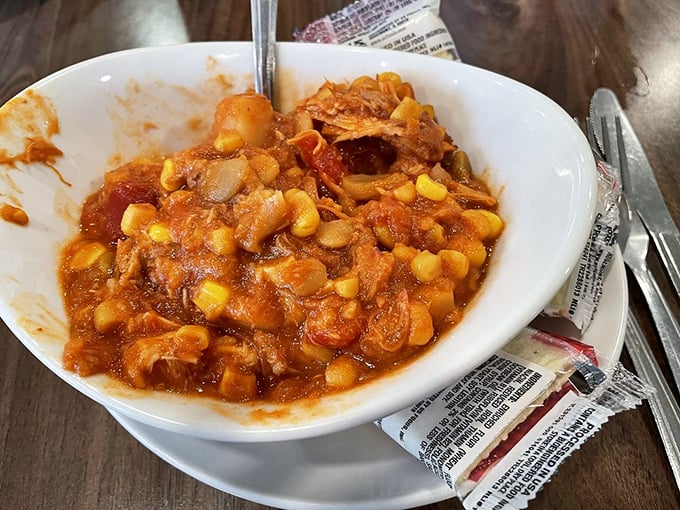 Brunswick stew that looks like it could tell stories about generations of Virginia cooks. Each spoonful is a chapter in Southern food history.