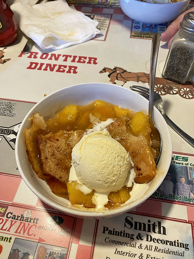 Warm fruit cobbler topped with vanilla ice cream&mdash;where the cold meets hot in a dessert romance that never gets old.