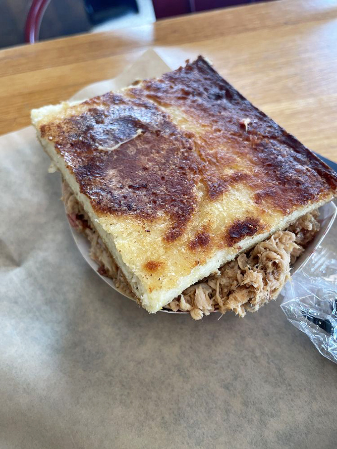 Cornbread that could make a Southern grandmother misty-eyed &ndash; crisp-edged, hearty, and the perfect vehicle for sopping up every last bit of barbecue.