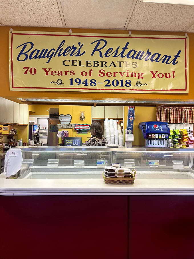 The counter proudly announces "70 Years of Serving You!"&mdash;and judging by those classic diner interior, they've been collecting stories the entire time.
