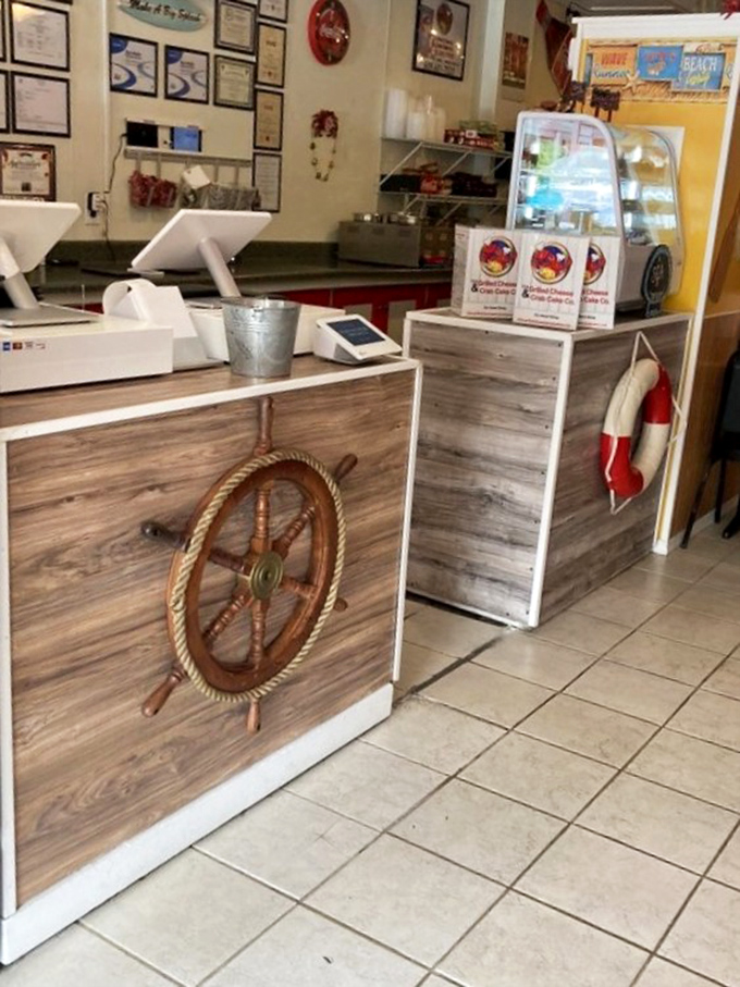 The ship's wheel at the counter hints at nearby shores. This place knows exactly what coastal comfort food should be.