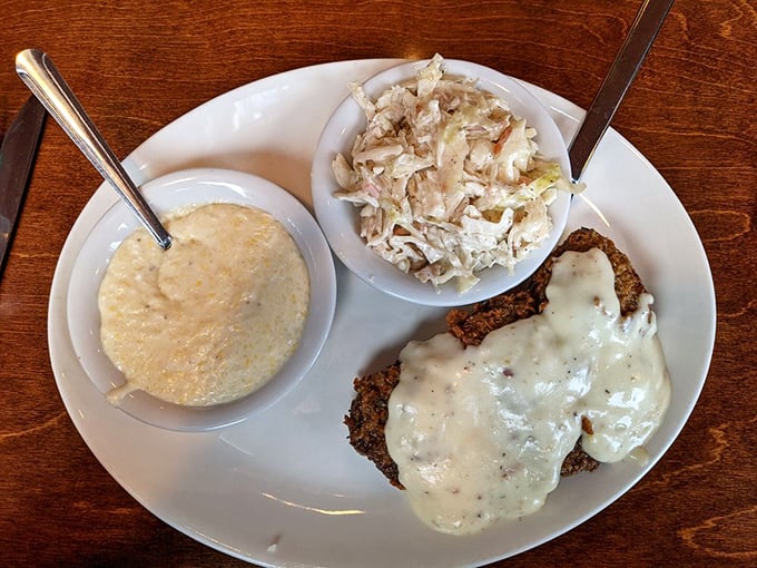Country fried steak with gravy and sides &ndash; the breakfast equivalent of a warm hug from your favorite aunt.