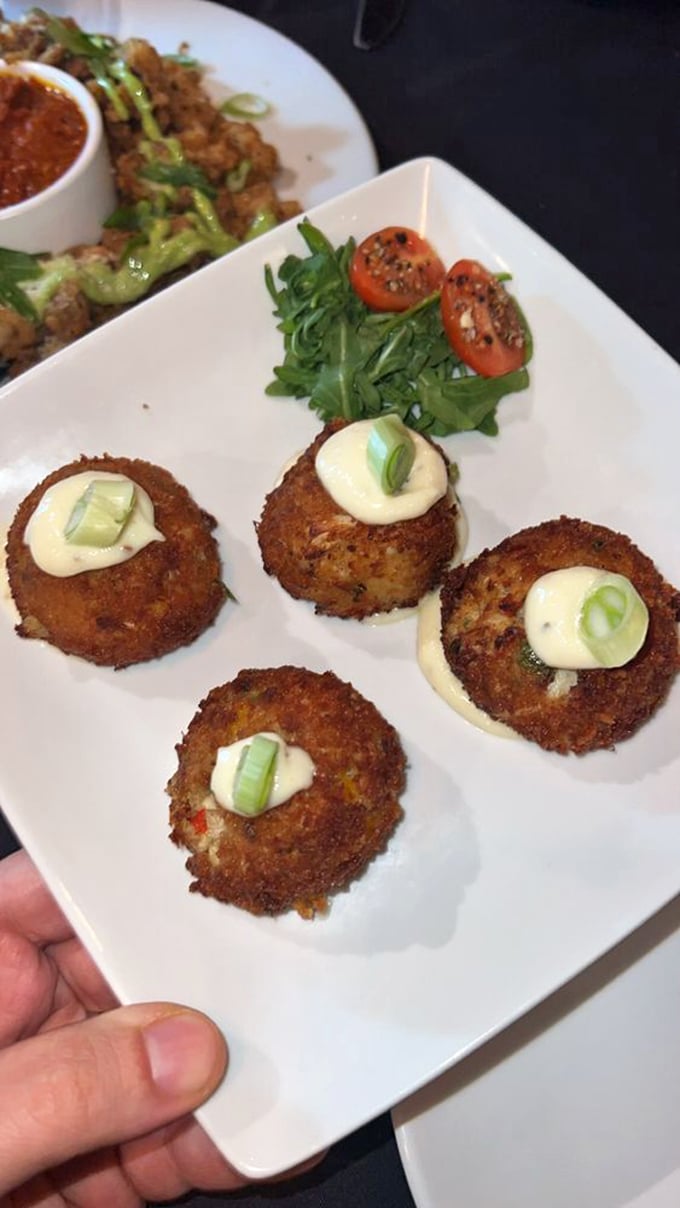Crab cakes with the perfect ratio of crab to cake&mdash;mostly crab, just enough cake to hold the party together. Like edible gold coins.