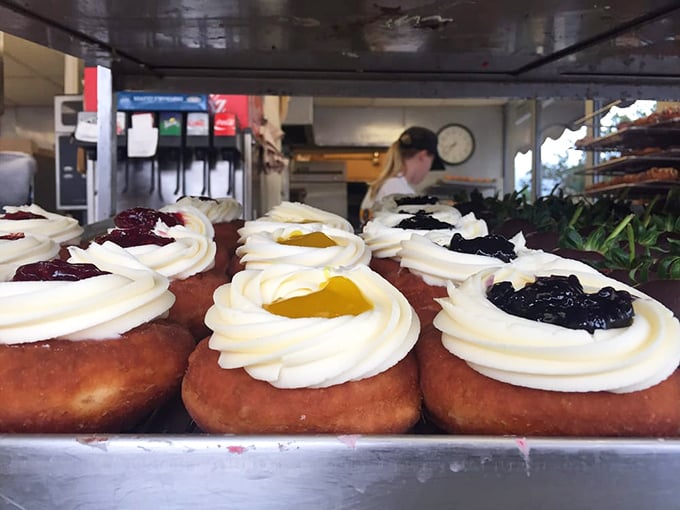 Cream cheese donuts with fruit centers&mdash;the mullet of pastries. Business on the outside, party in the middle. Pure genius.