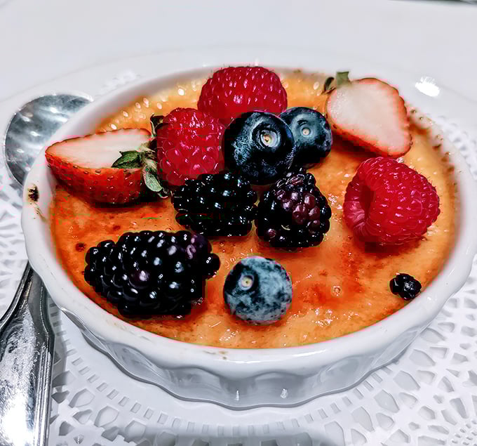 This cr&egrave;me br&ucirc;l&eacute;e with fresh berries doesn't just end your meal&mdash;it provides closure. The perfect sweet finale to a symphony of savory notes.
