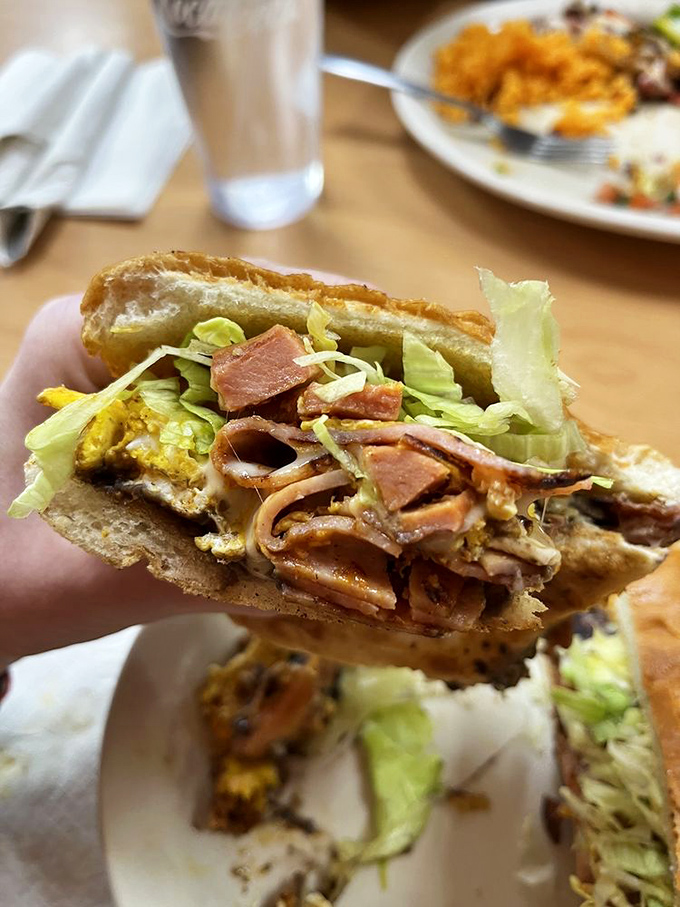 The Cubana torta&mdash;a sandwich so stuffed with goodness it needs its own zip code. Layer upon layer of flavor between bread that's just trying to keep up.