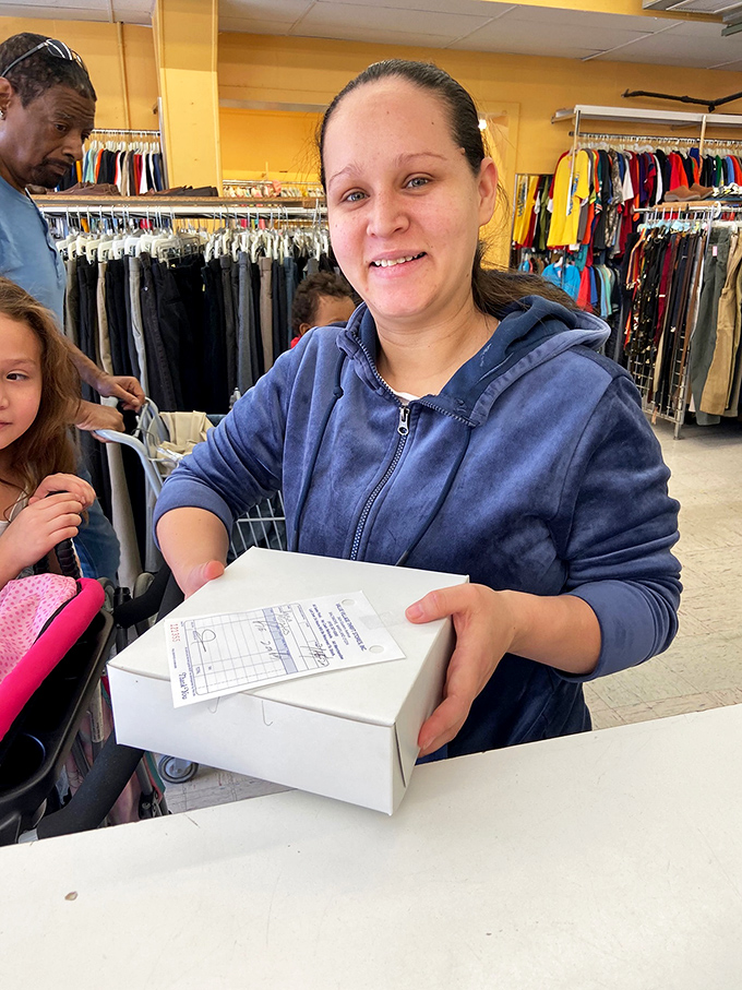 The universal thrift store victory smile&mdash;that moment when you've found something so good you can barely contain your smugness.