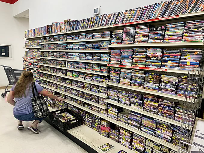 The DVD wall—a nostalgic time capsule where forgotten film favorites and binge-worthy series await their second act in your home theater.