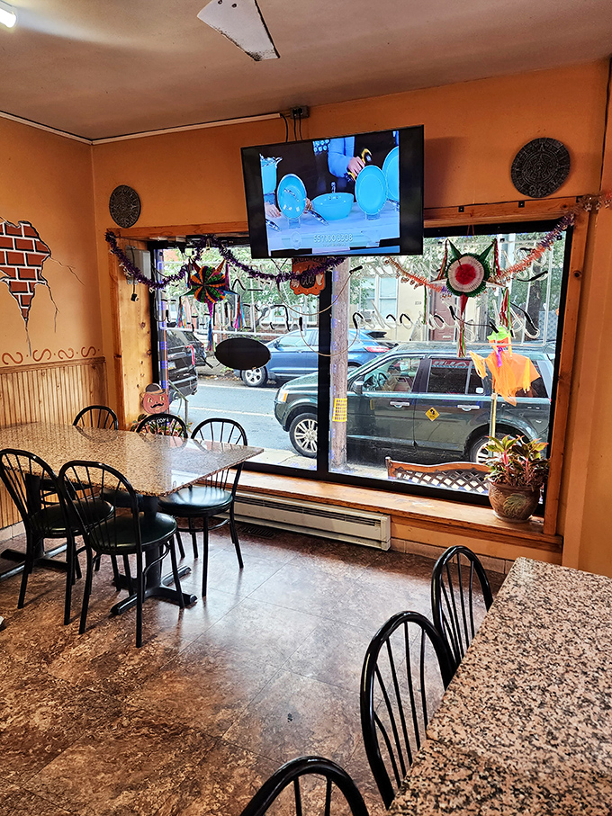 Those colorful decorations aren't for tourists&mdash;they're reminders of home. The TV in the corner says, "Stay awhile, you're family now."