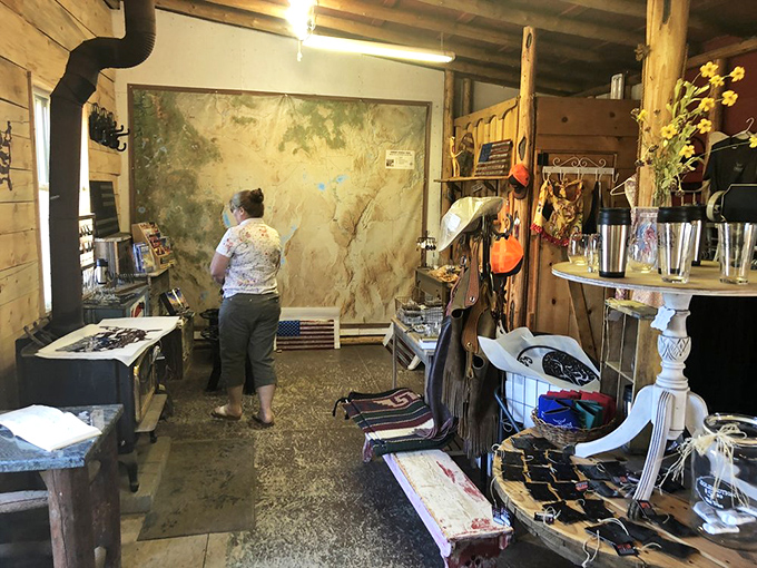 Inside the Cowboy Dinner Tree, where every inch of wall and ceiling space tells a story of Western heritage and hungry travelers.
