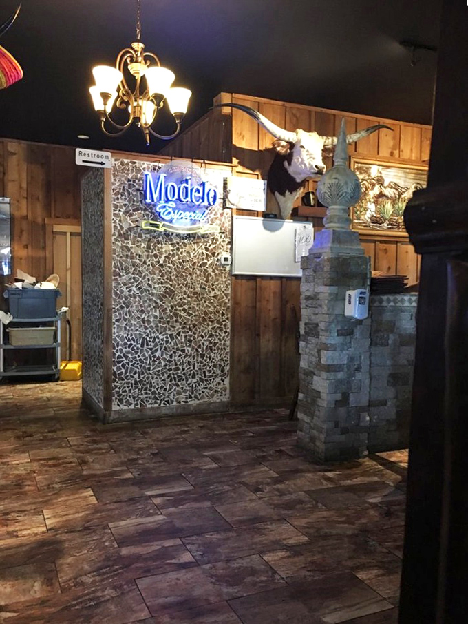 The interior decor blends Southwestern charm with unexpected touches&mdash;like that longhorn and Modelo sign creating the perfect "Texas meets Mexico" vibe.