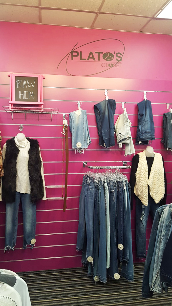 The pink wall display showcases denim in all its glory, from distressed to pristine, proving that good jeans never go out of style.