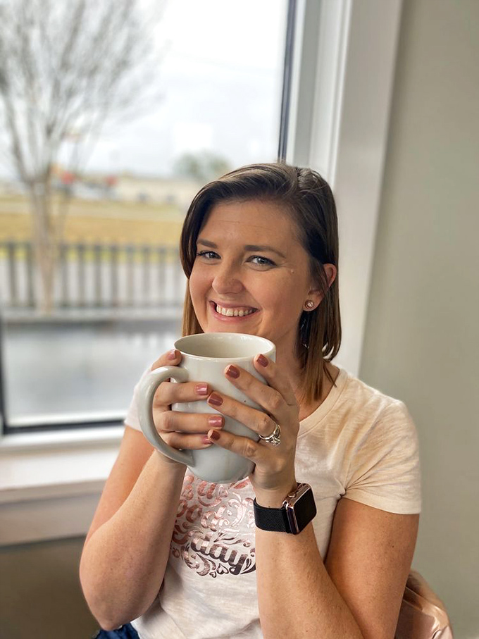 The universal expression of coffee contentment. That mug isn't just holding a beverage; it's cradling liquid happiness in a ceramic embrace.