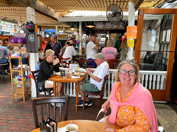 Where locals and visitors break bread together, sharing the communal joy of good food in a space where everyone feels like a regular.
