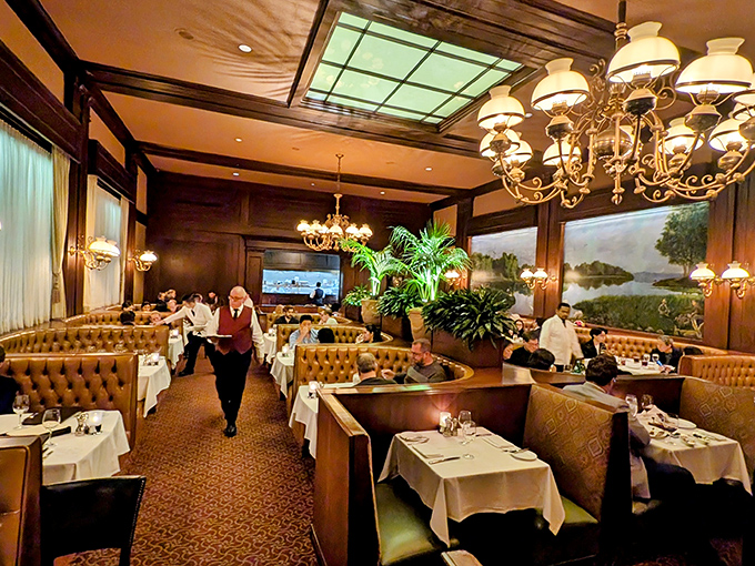 Servers glide through the room with practiced precision, delivering plates that prompt involuntary gasps and the clicking of countless cameras.