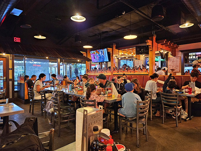 A full house of happy faces and empty plates. At Phil's, strangers become friends united by the universal language of great BBQ.