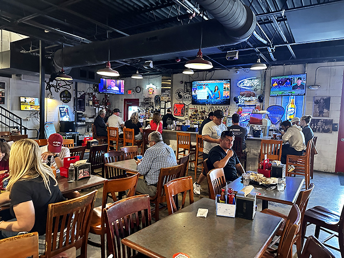Where barbecue pilgrims gather at wooden tables for a smoky communion that transcends mere eating.