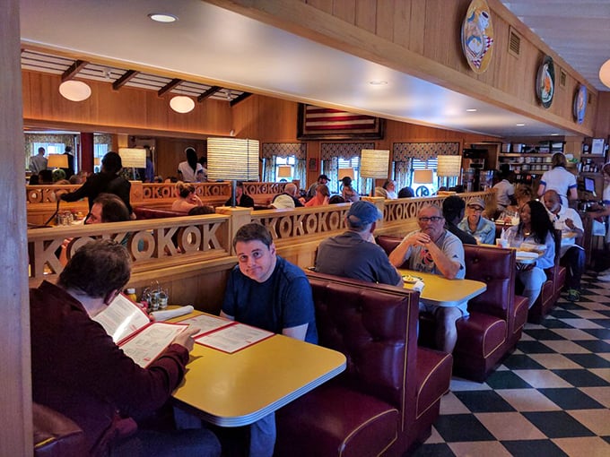 Where strangers become neighbors over biscuits and gravy. The bustling dining room hums with conversation and the promise of comfort food.