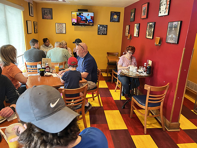Where breakfast decisions are made and friendships are cemented. Red and yellow walls frame morning rituals perfectly.