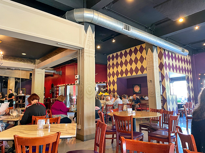 The dining room's harlequin patterns aren't just decoration &ndash; they're a warning that normal rules of culinary restraint don't apply in this magical space.