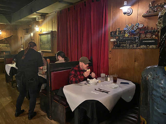 Red plaid and concentration&mdash;the universal uniform and expression of someone about to experience something truly worth savoring.